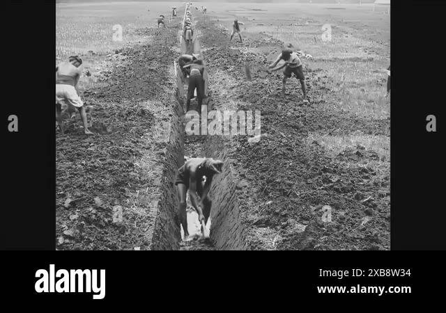 1920s - Farmers dig irrigation ditches, use hoes and scythes in the ...