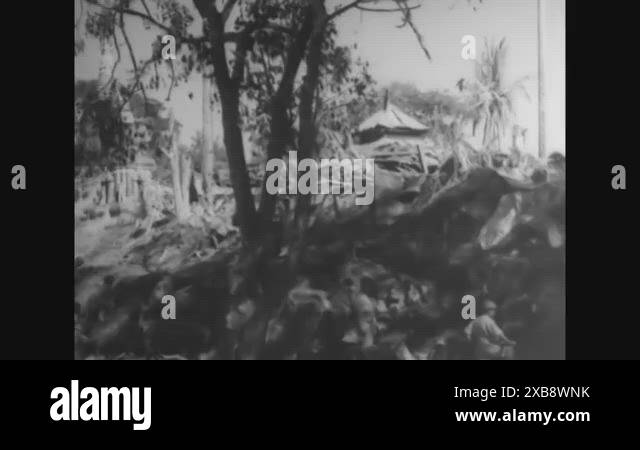 1940s - After the explosion of a small building Chinese troops are ...