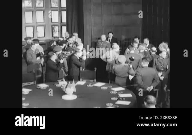 1945 - Churchill, Truman, and Stalin, seen from the side, are standing ...