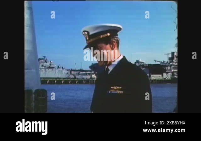 1960s - US Navy sailors stand proudly atop their submarine Stock Video ...