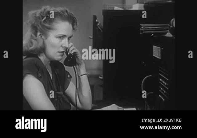 Examples of poor telephone etiquette are shown in an office in 1946 ...