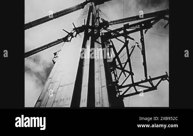 The construction of the main span of the Golden Gate Bridge stretches ...