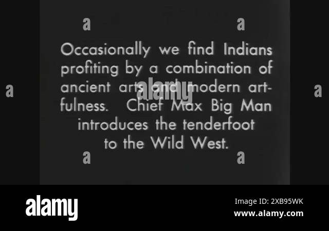 Footage of an American Indian chief with a full feather head dress and ...