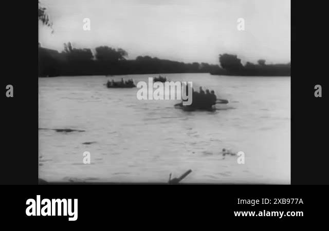 American military forces cross the Seine into Paris fighting Nazis at ...