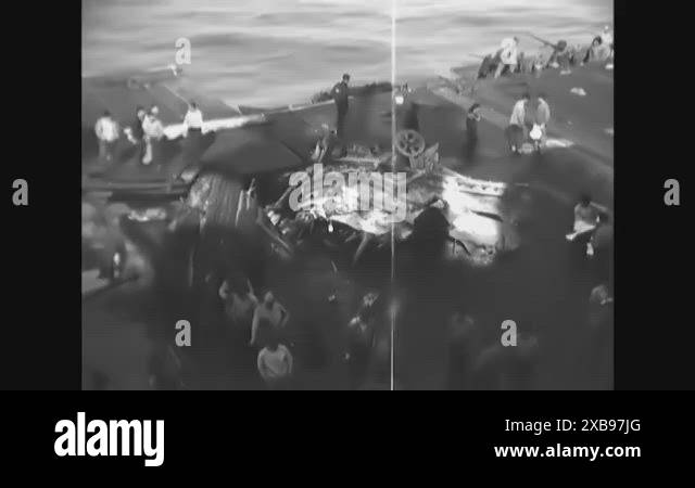 1945 - Smoke, damage, and rubble on the flight deck USS Bunker Hill ...