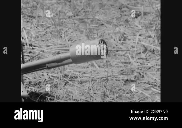 1942 - A United States Marine demonstrates how to use a captured ...