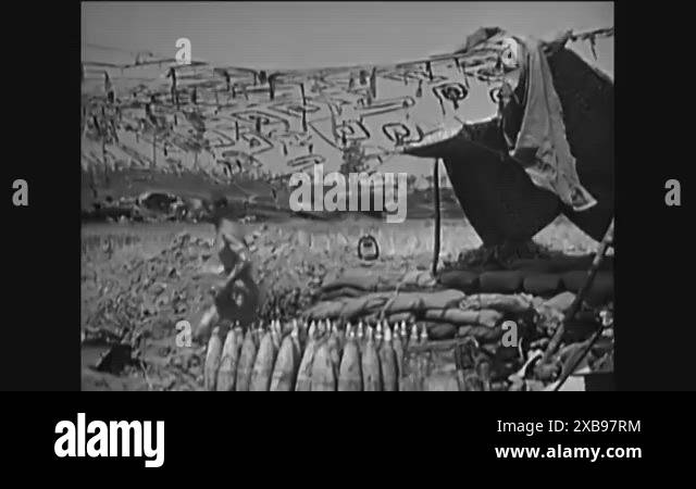 1945 - Men load and fire howitzer in Okinawa during WW2 Stock Video ...