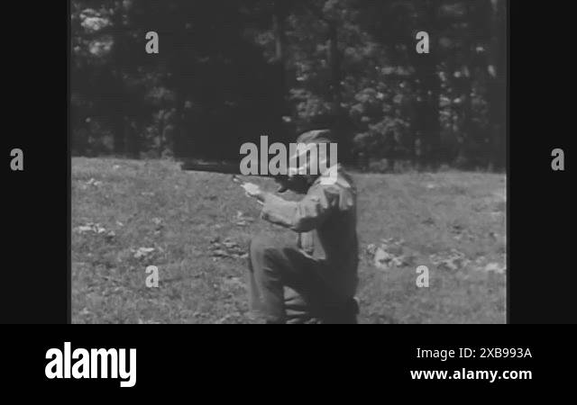 A soldier missing one arm works on his shooting skills in the 1950s ...