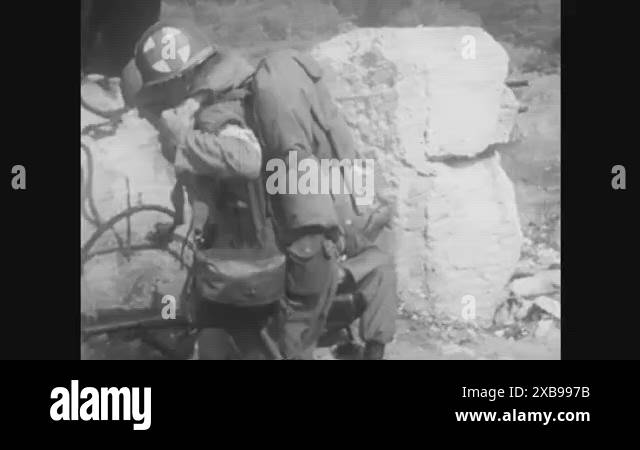 A medical core soldier delegates a task to help a distressed soldier to ...