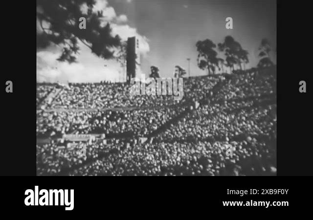 Women's gymnastics teams walk into the stadium for the 1936 Olympics ...