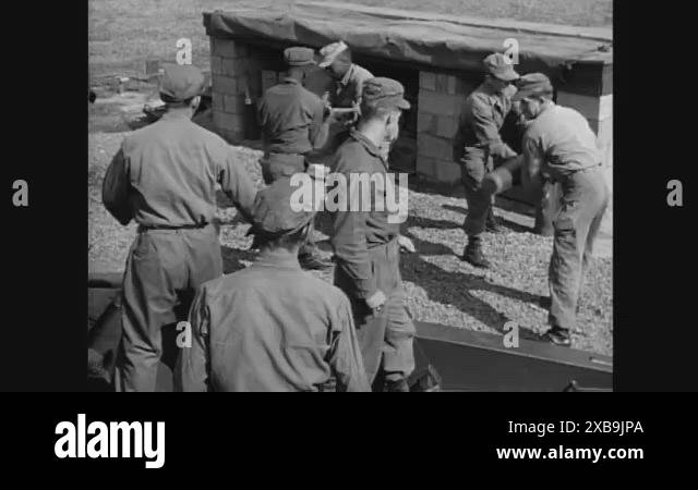 A group of army officers prepare their cannons in the eventuality of ...