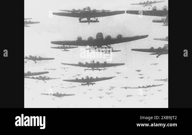 A fleet of warplanes flies overhead and bombers drop bombs as Joseph ...