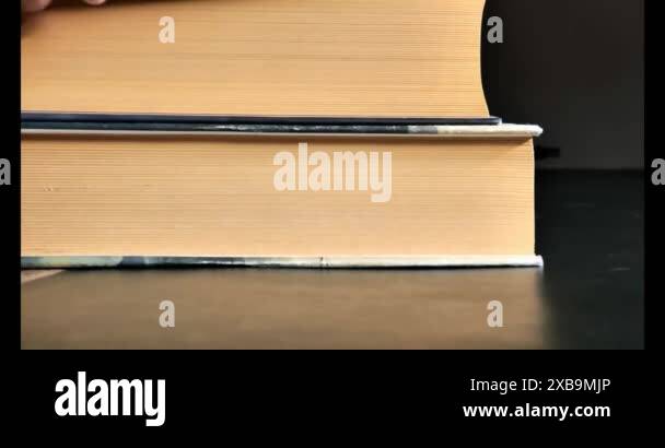 Stack old tattered books Stock Videos & Footage - HD and 4K Video Clips ...