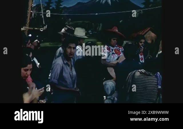 1960s - Shots of townspeople in a Mexican town center on Good Friday ...