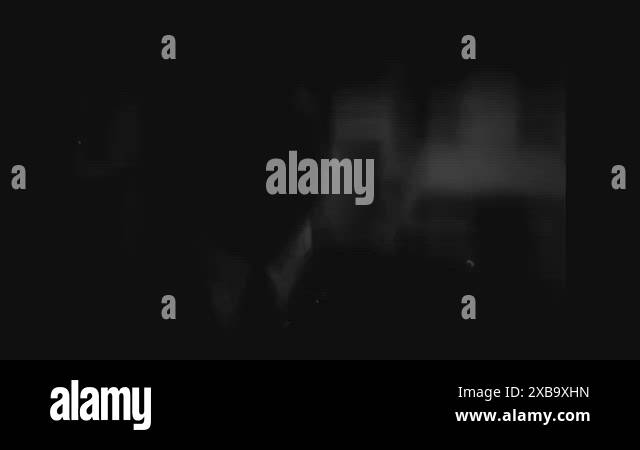 Pretty girls sing and serve food at a drive thru restaurant in the ...