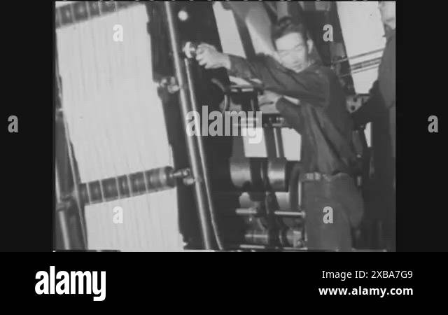 Tons of printed papers are bought to the mailing room for the making of ...