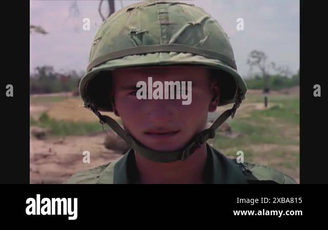 1966 - Closeup of two young purple heart recipients. Soldiers are ...