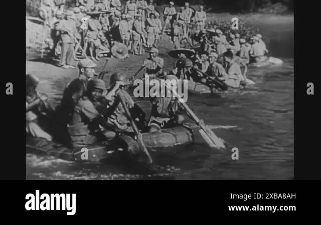 Soldiers cross successfully a river in Burma. During a peaceful time ...
