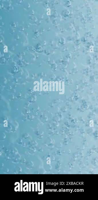 Vertical video - abstract blue water motion background animation with ...