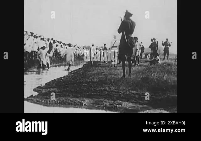 Indians riot over the arrest of Mahatma Gandhi at the Dandi Salt March ...