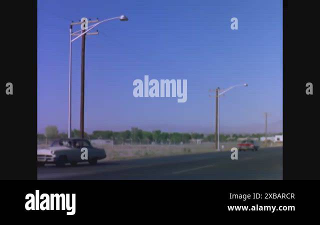 1960 - Cars enter the main gate at Nellis Air Force Base at a reunion ...