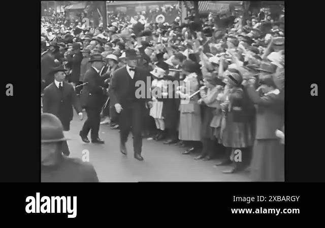1919 - President Woodrow Wilson and First Lady Edith Wilson ride in a ...