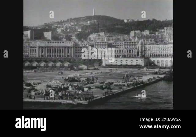Victorious Allied troops parade and General Dwight David Eisenhower ...