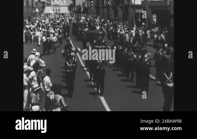 1930s Mary Pickford is welcomed with street parade as she makes her way ...