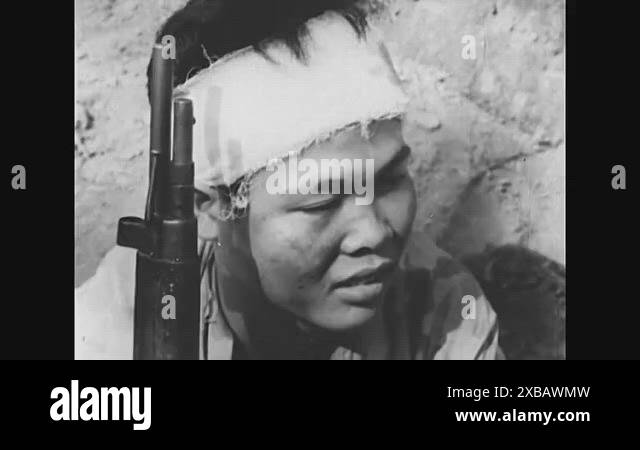 Newspaper headlines, warships, a helicopter, a warplane and Ho Chi Minh, leader of the People's ...