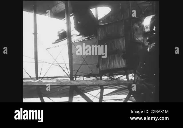 Bombs are loaded and a Royal Naval Air Service folding hydroplane is ...