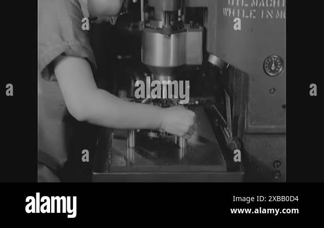1942 - At a supercharger plant, woman operates a Madison Surface ...