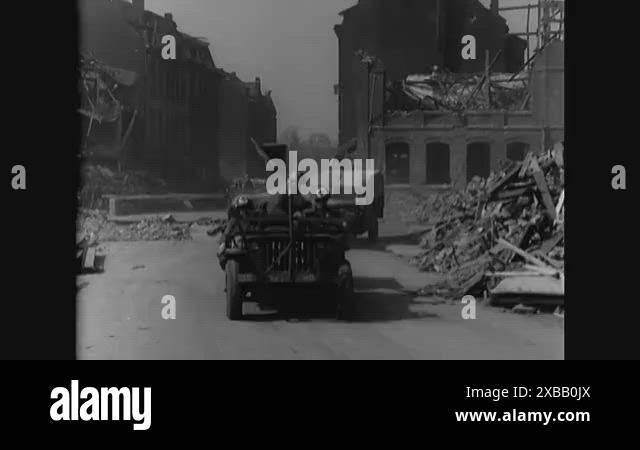 1945 - Men in the US Army medical corps and 35th division drive through ...