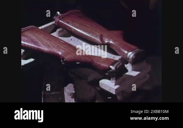 Gun stocks are hand checkered at a Dupont gun facility in the 1960s ...
