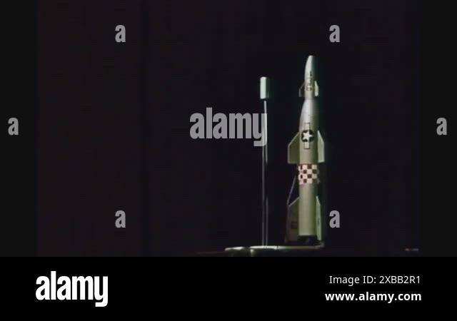 A man explains to his nephews that rockets must be launched in stages ...