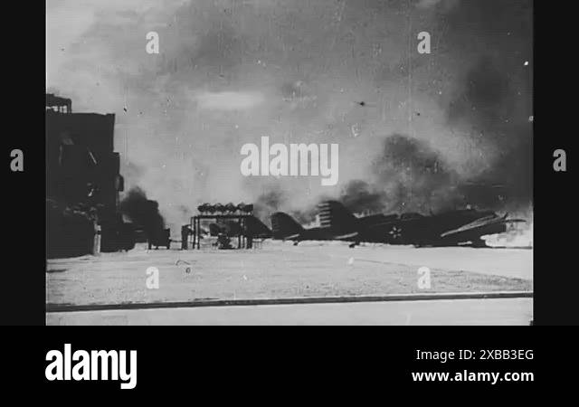 Soldiers arrange the bodies of their dead colleagues in row on a hill ...