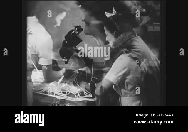 An adolescent girl and boy quarrel about whose notebook is whose inside ...