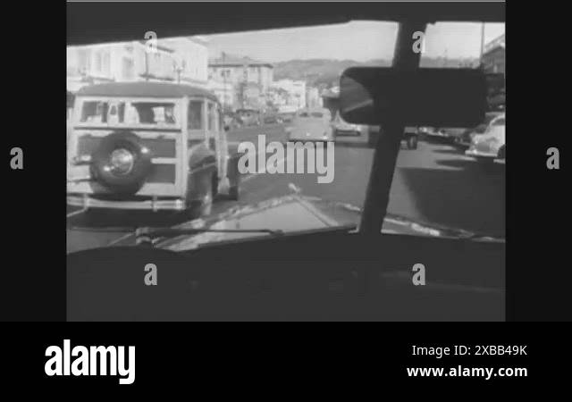 Pedestrians walk in blind spots, exit a car on the curbside, and walk ...