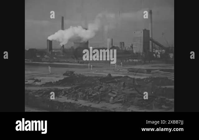 Shots of a nuclear power plant and oil rigs in the 1950s Stock Video ...