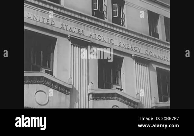 Scientists enter the United States, Atomic Energy Commission building ...