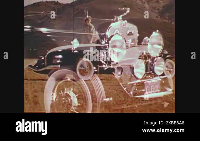 Various classic cars, including a 1931 Rolls Royce Phantom, a Chrysler Imperial LeBaron, a ...