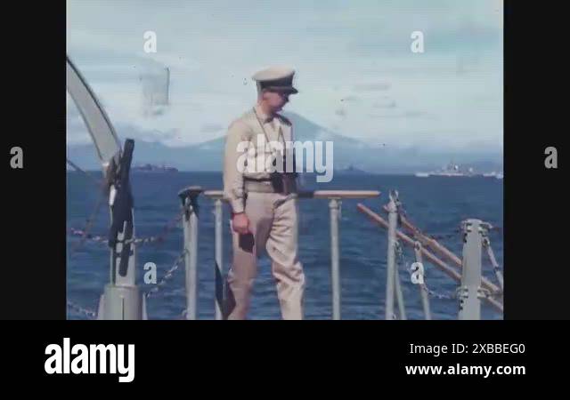 1945 - British officer comes aboard the USS IOWA near Mount Fuji during ...