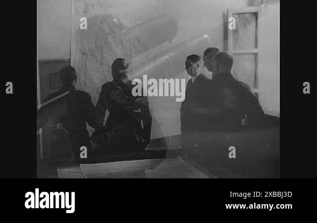 Adolf Hitler plots, Nazi troops march, civilians speak and the British ...