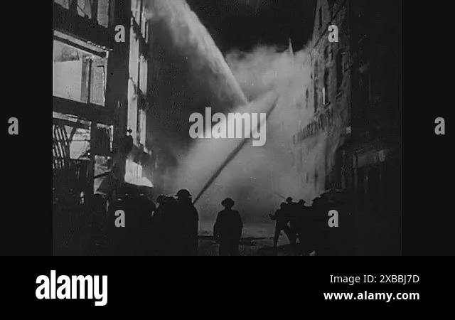 The British Fire Brigade pumps water from the River Thames to combat ...