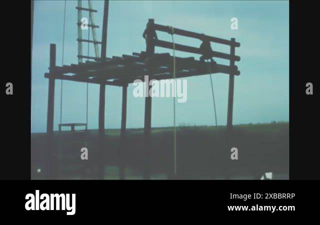 1967 - American troops in the 1st Training Battalion climb a ladder and ...