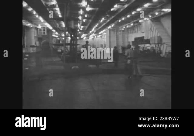 1955 - The hangar deck, flight deck and operations tower are shown on ...