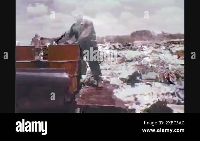 People dumping garbage into a landfill in the 1960s Stock Video Footage ...