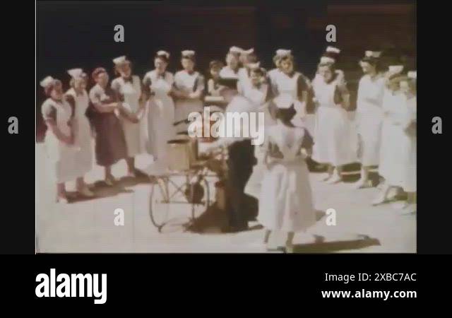 Student nurses use fire extinguishers to put out a fire during a fire ...