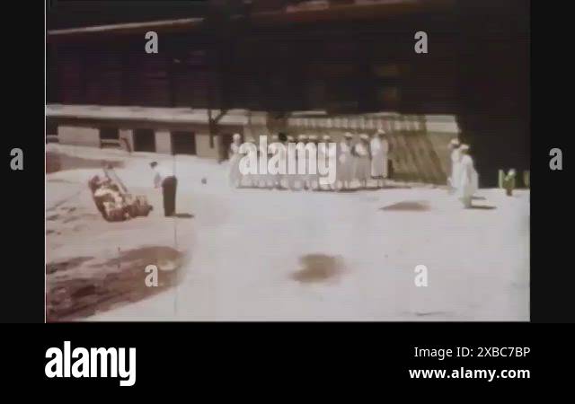 Student nurses use fire extinguishers to put out a fire during a fire ...