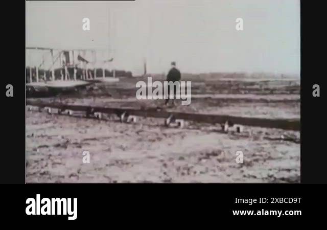 1966 - Footage of the Wright brothers' early work is compared to a ...