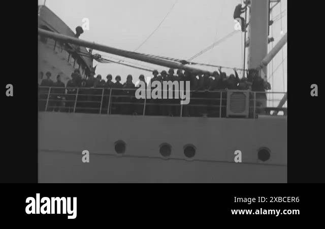 GERMANY - 1951 - Men wave from the USNS Alexander M. Patch, a young ...
